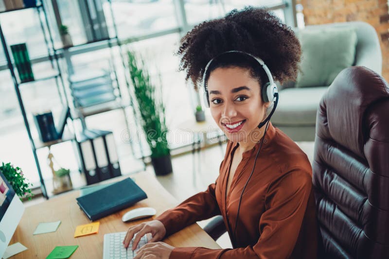Professional Businesswoman with Headset Working on Computer in Modern ...