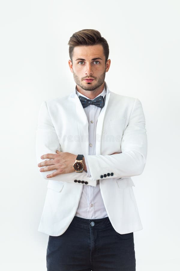 A Man in a Suit with Arms Outstretched on a Stone Staircase To the ...