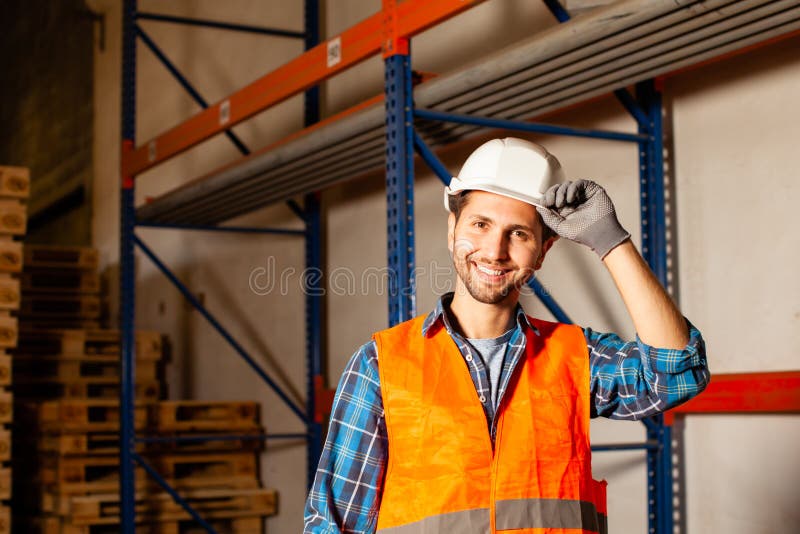 Confident Handsome Worker in Protective Hardhat and Uniform at the ...
