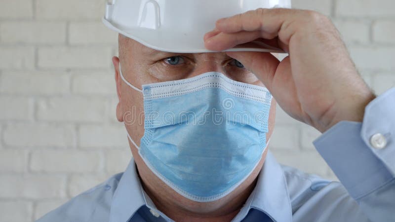 Confident Image with an Engineer Wearing Face Protection Mask Against ...