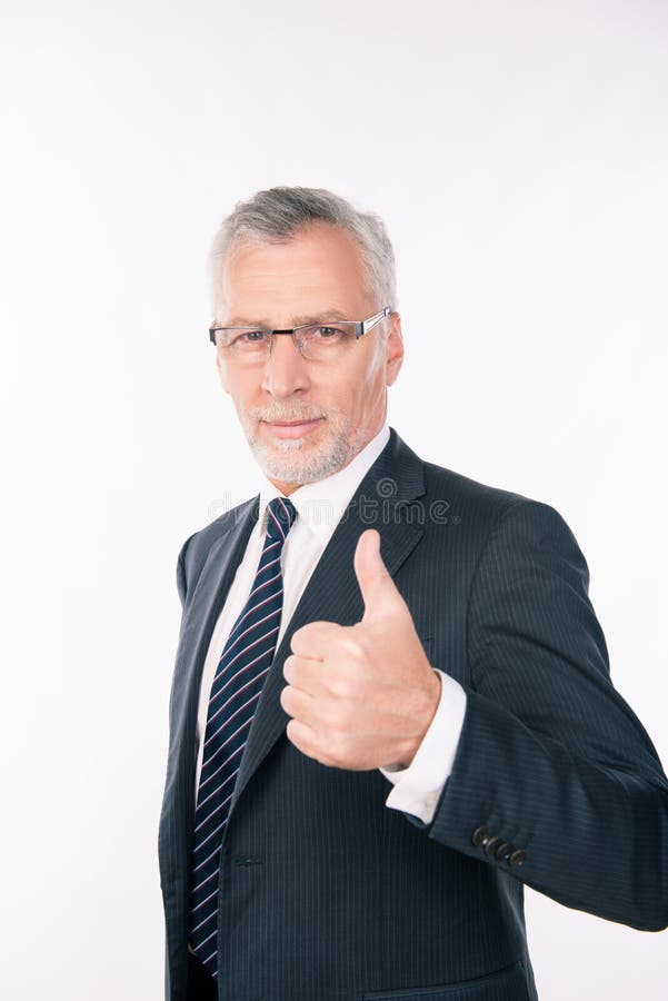 Confident Intelligent Businessman Showing Thumb Up Stock Photo - Image ... Confident Intelligent Businessman Showing Thumb Up Stock Photo - Image ...