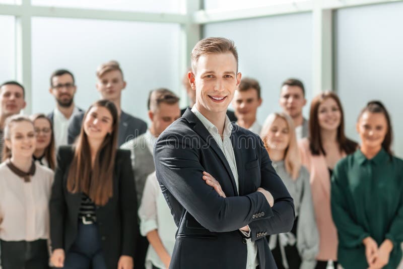 Confident Leader Standing in Front of a Group of Young People Stock ...