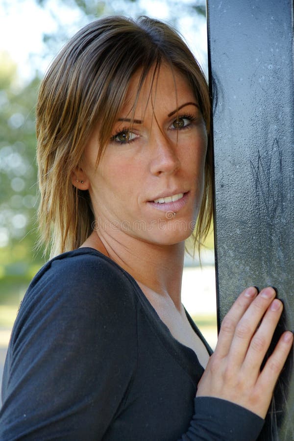 Confident Looking Woman Posing in Front of Camera Stock Photo - Image ...