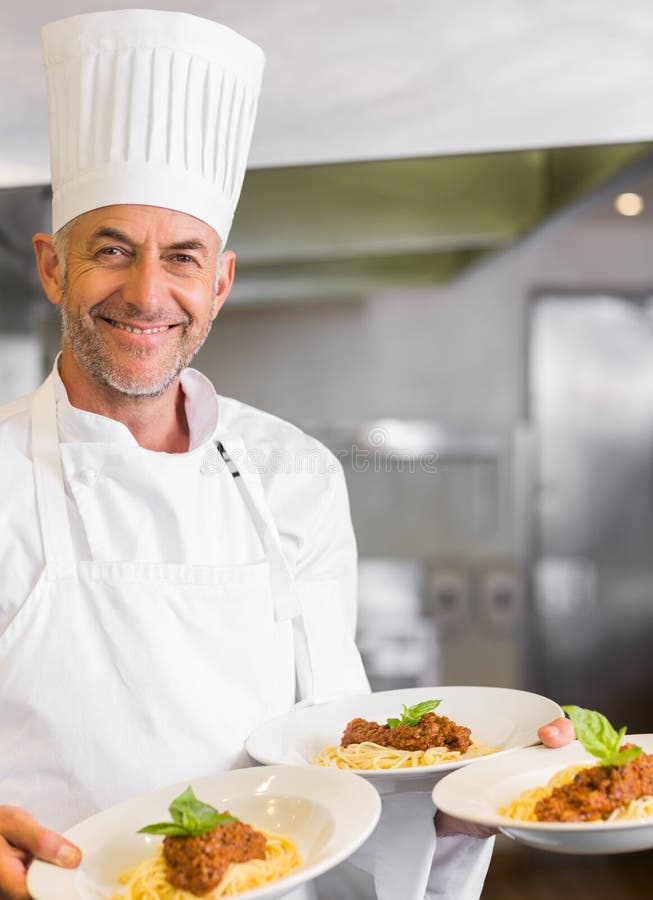 Confident Male Chef with Cooked Food in Kitchen Stock Photo - Image of ...