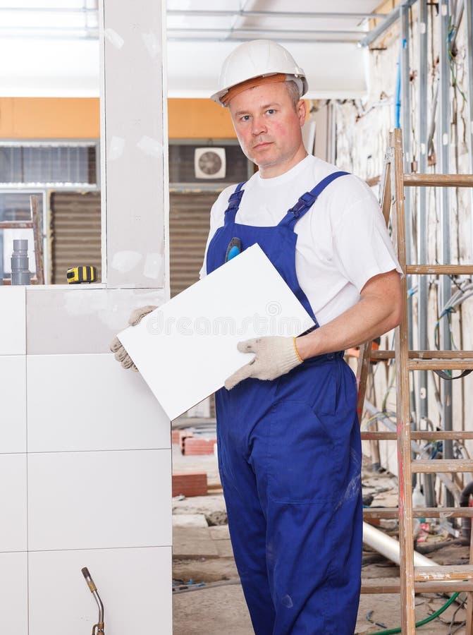 Contractor Installing Ceramic Tile Stock Photo - Image of installing ...