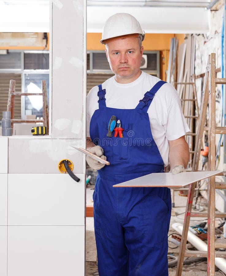 Contractor Installing Ceramic Tile Stock Photo - Image of ...