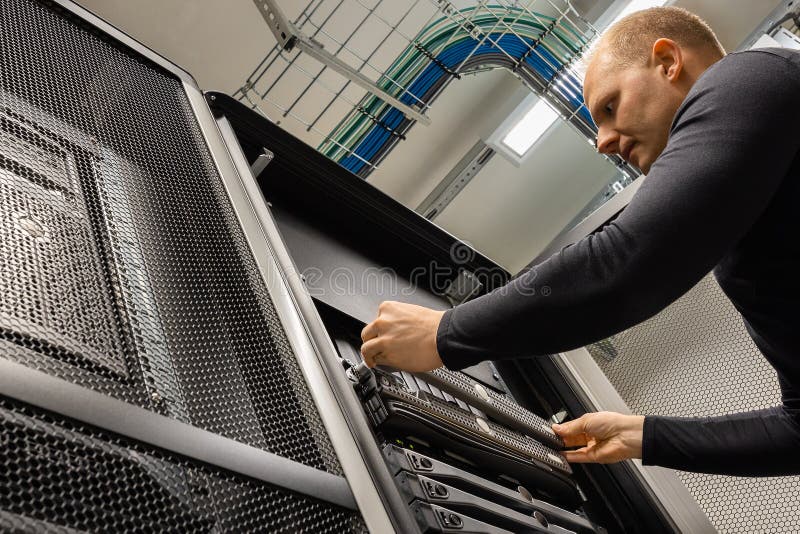 Installing Rack Server stock photo. Image of occupation - 29555588