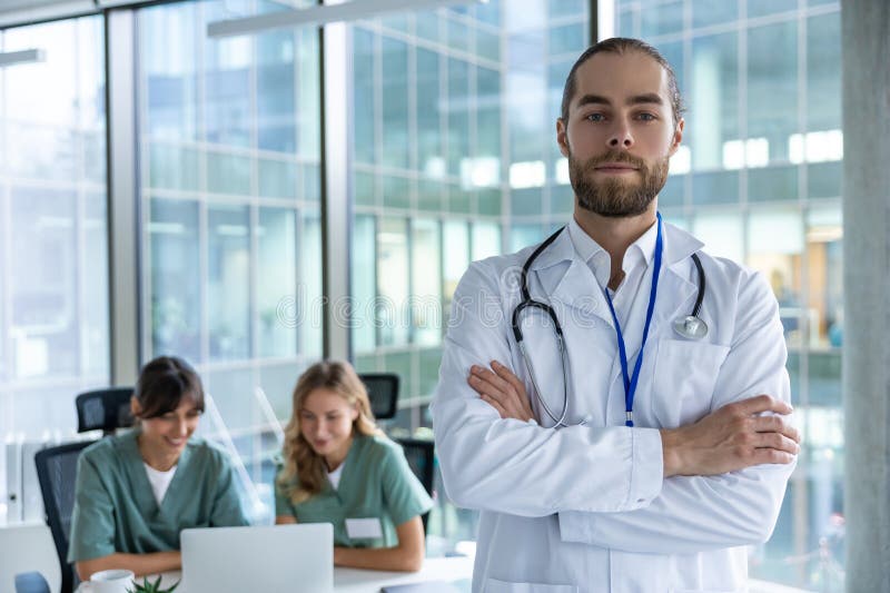 Confident Male Young Doctor in a White Lab Coat Stock Photo - Image of ...