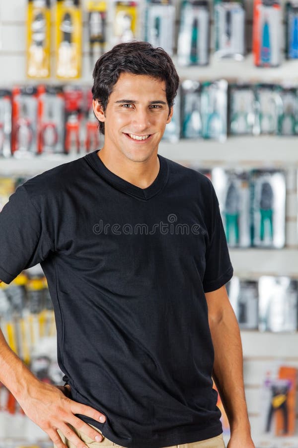 Confident Man in Hardware Store Stock Image - Image of shopkeeper ...