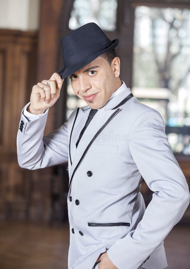 Confident Man Holding Hat while Performing Tango Stock Image - Image of ...