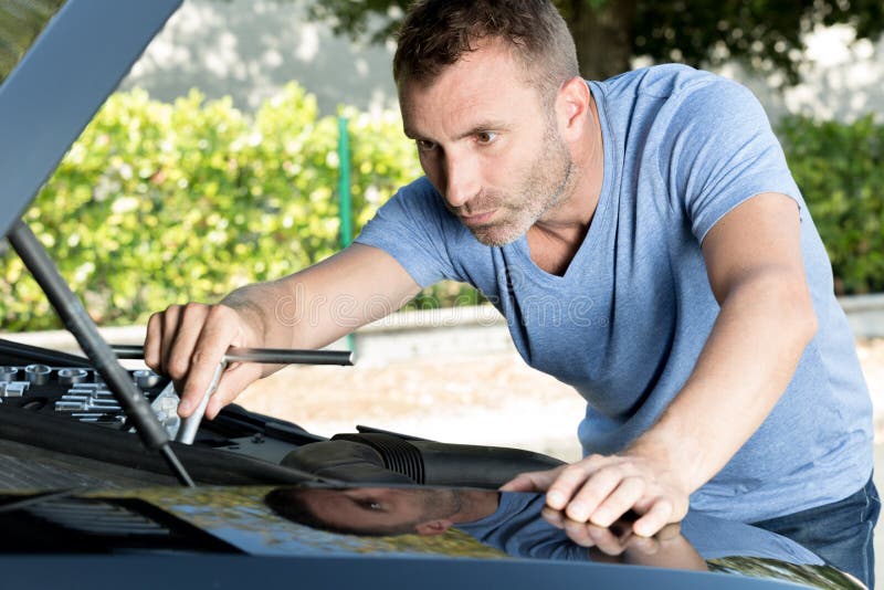 Confident Man Working on Car Engine Stock Image - Image of assistance ...