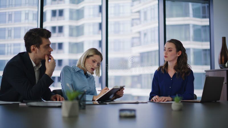 Confident Manager Explaining Project To Office Colleagues Sitting ...