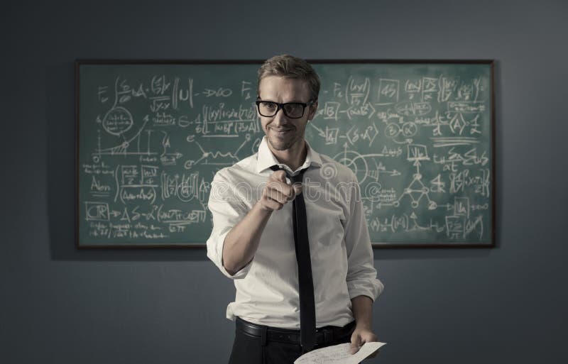 Confident Math Professor Teaching in Front of the Chalkboard Stock ...