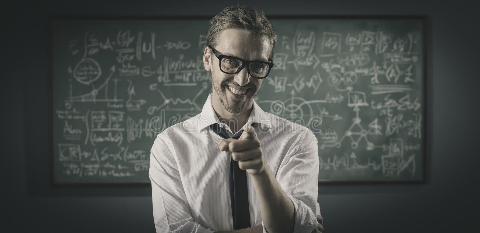Confident Math Professor Pointing at Camera Stock Photo - Image of ...
