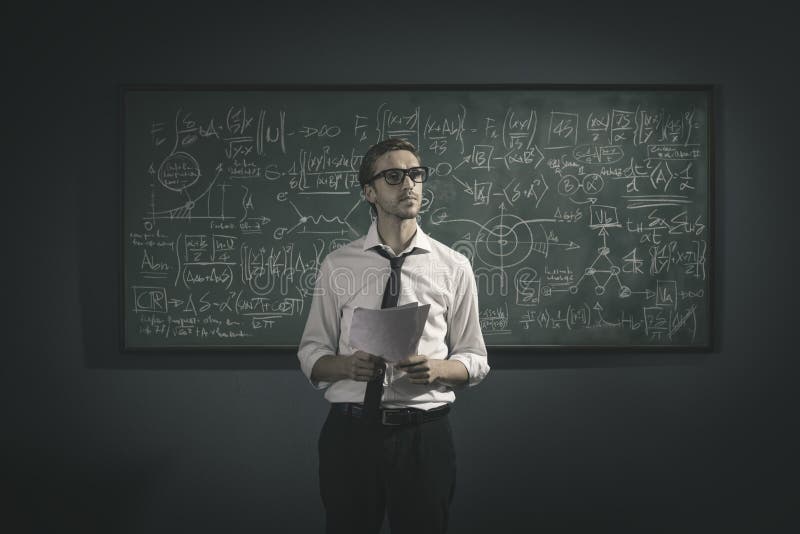 Confident Math Professor Teaching in Front of the Chalkboard Stock ...