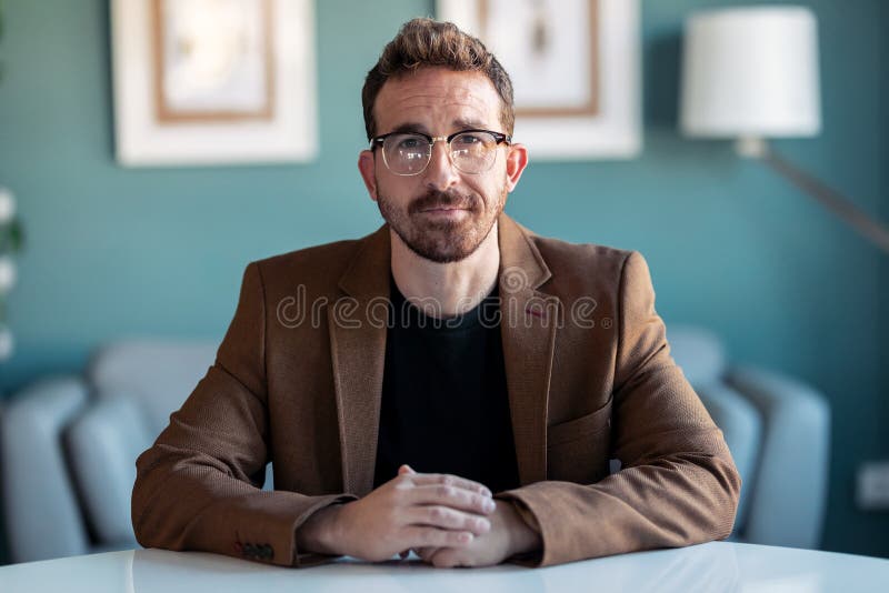 Confident Mature Man Explaing Something Looking at Camera while Doing ...