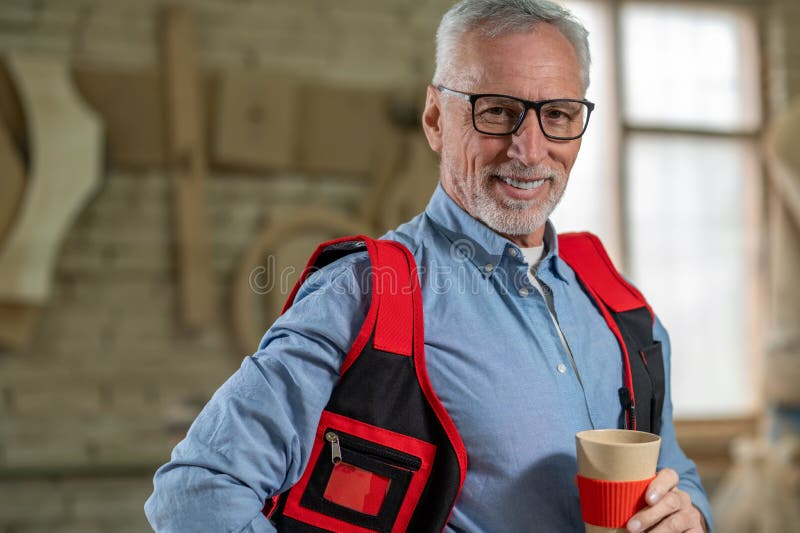 Confident Mature Man with a Paper Cup with Coffee Stock Photo - Image ...
