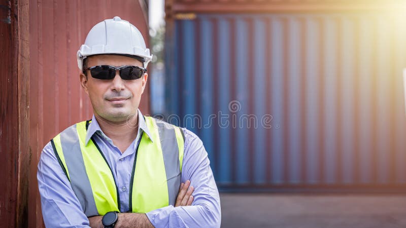 Male Engineer in Blue Jumpsuit and White Hard Hat Operating Lathe ...
