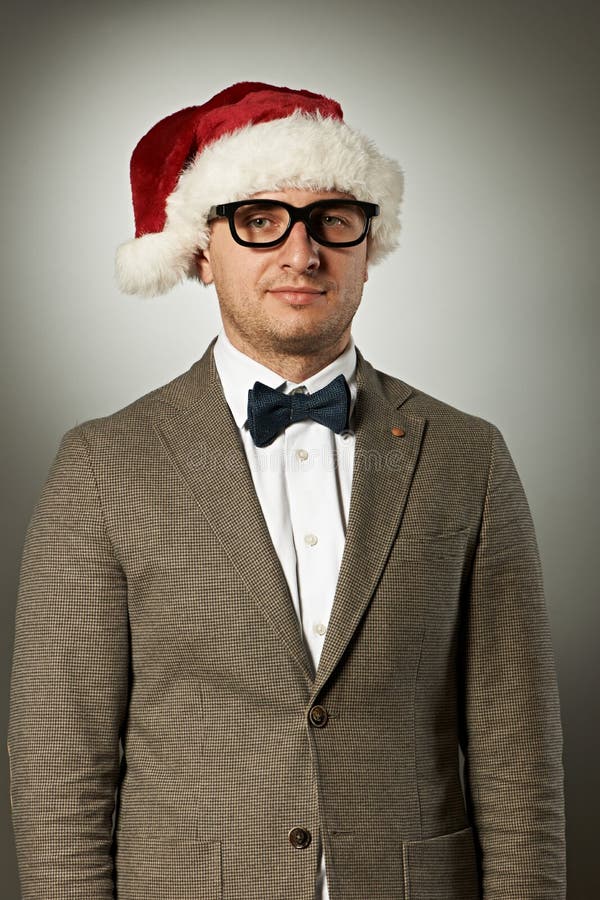 Confident Nerd in Santa Claus Hat and Bow Tie Stock Image - Image of ...