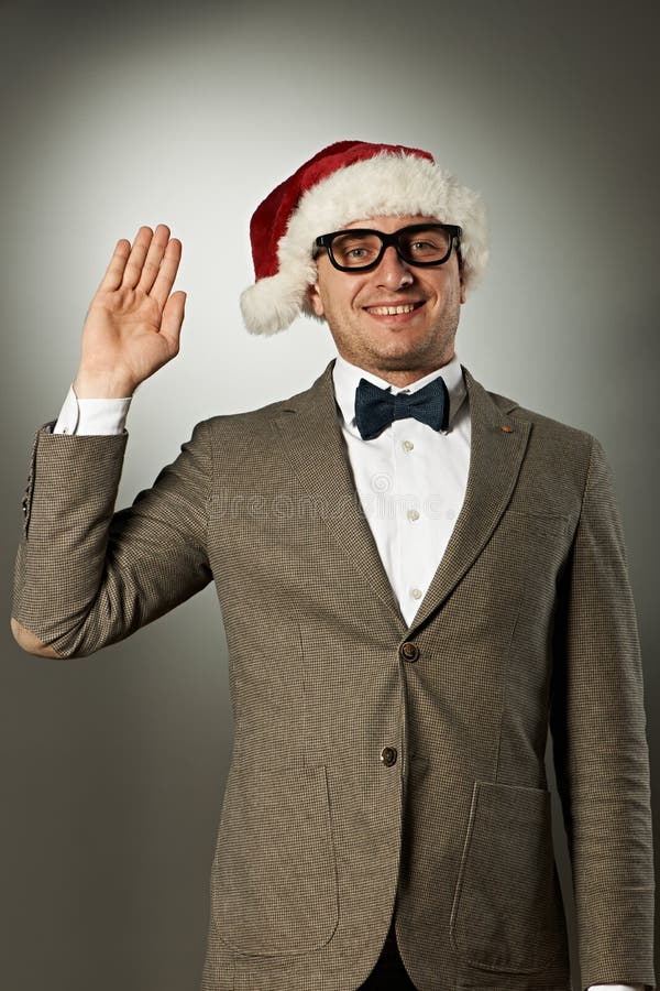 Confident Nerd in Santa Claus Hat and Bow Tie Stock Photo - Image of ...