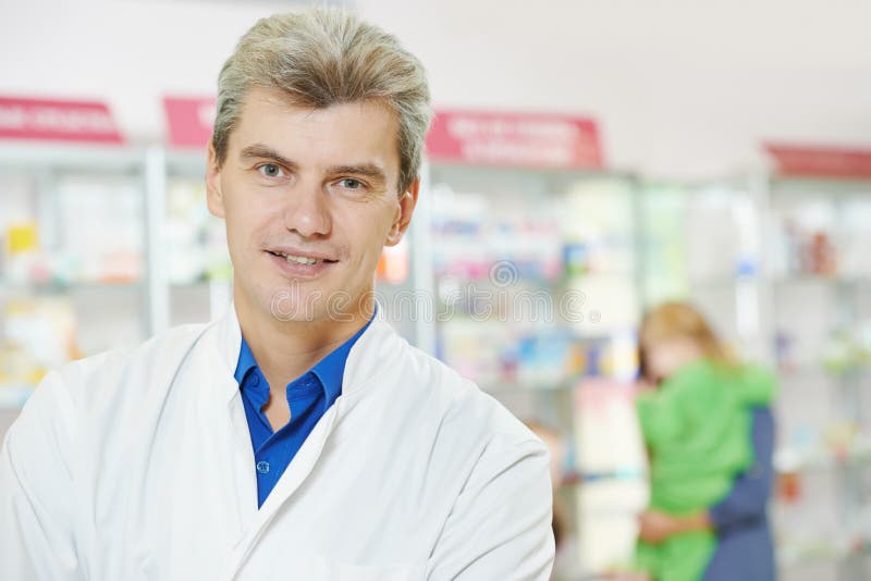 Confident Pharmacy Chemist Man in Drugstore Stock Photo - Image of coat ...