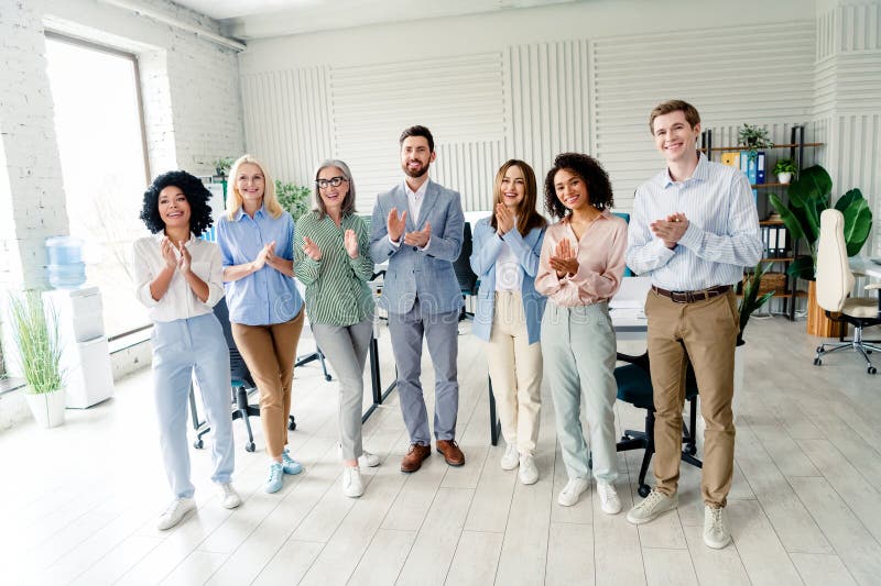 Group of Professional Colleagues Standing Together in Modern Office ...