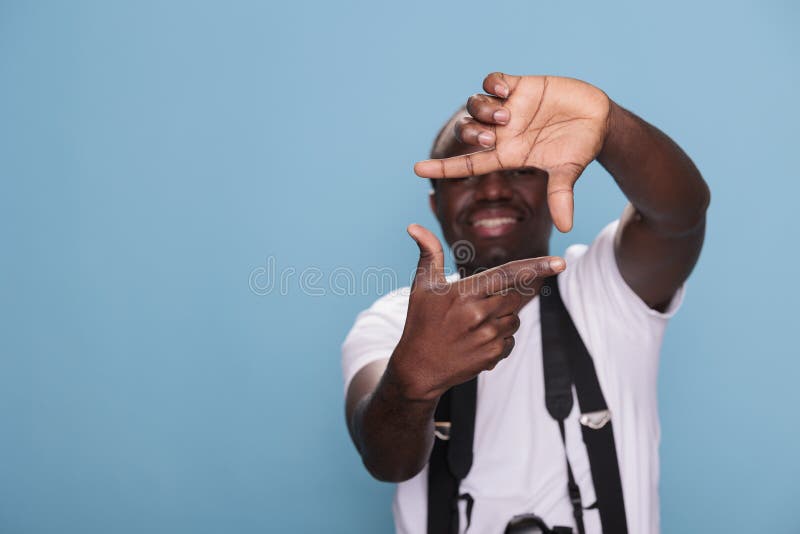 Confident Professional Photographer Doing Frame Gesture with Hands ...