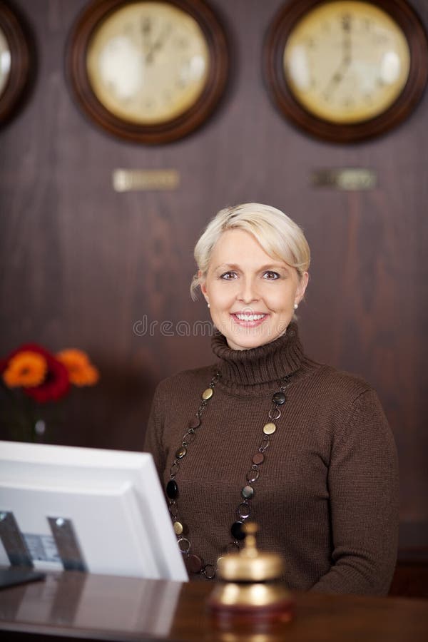 Confident Receptionist Behind the Counter Stock Image - Image of ...