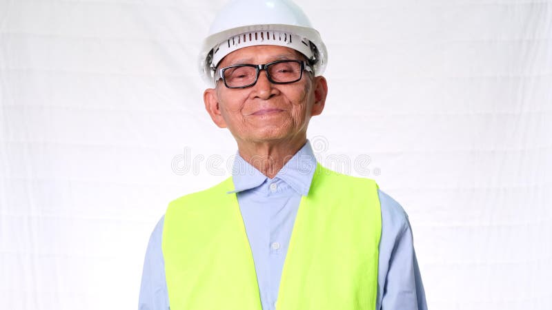 Confident Senior Engineering Architect Wearing Vest and Helmet on White ...