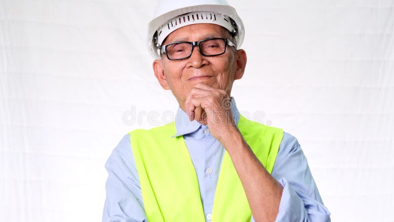Confident Senior Engineering Architect Wearing Vest and Helmet on White ...