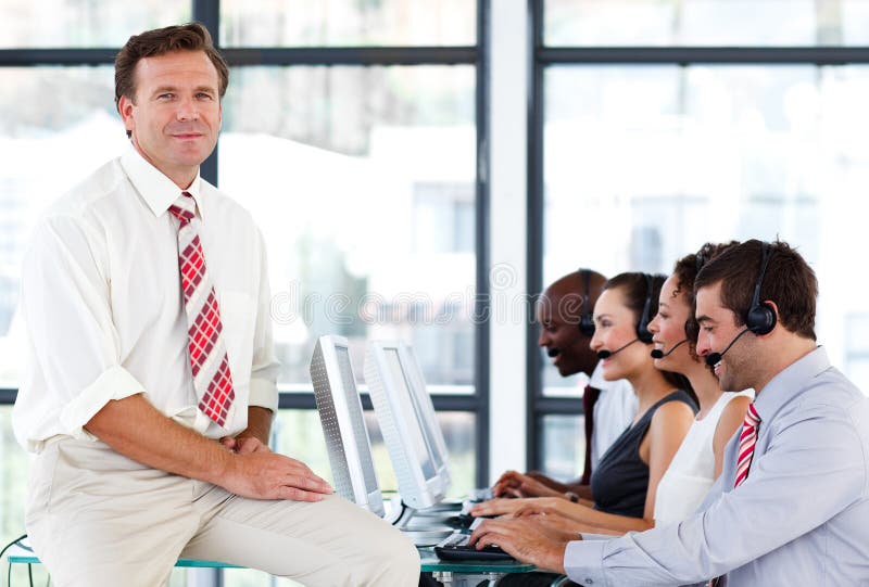 Confident Senior Manager in a Call Center Stock Image - Image of ...