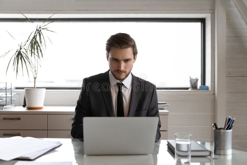 Confident Serious Young Ceo Executive Male Manager Working on Computer ...