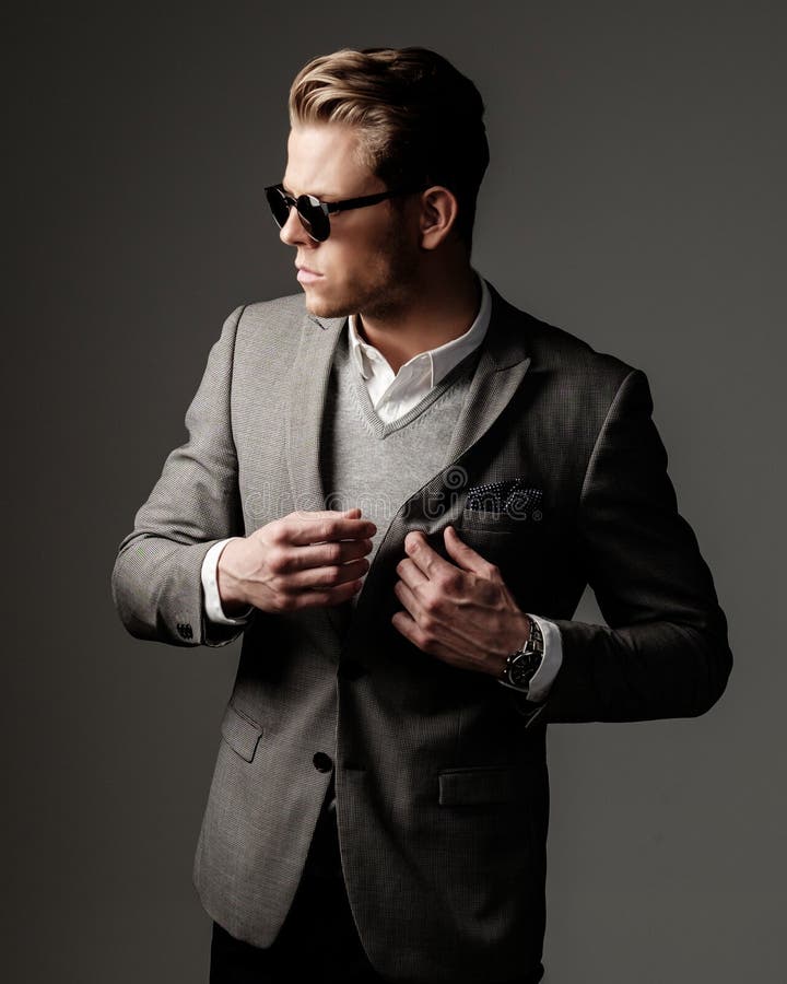 Sharp Dressed Man in Black Suit Against City Stock Image - Image of ...