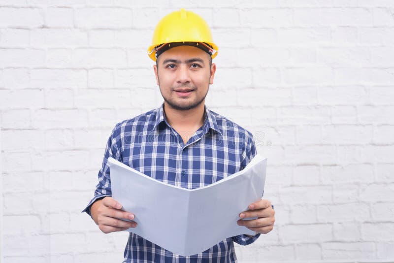 Confident Smiling Architect in Formal Wear Holding Blueprint. Stock ... Confident Smiling Architect in Formal Wear Holding Blueprint. Stock ...