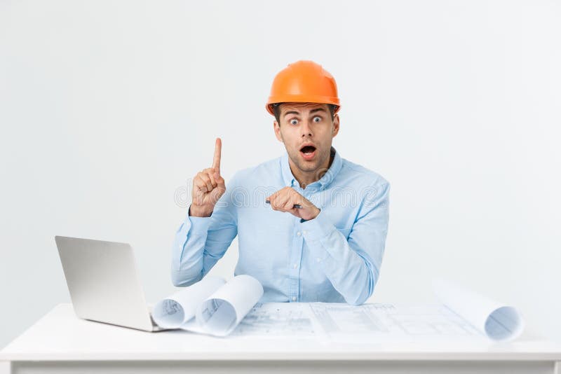 Confident Smiling Architect in Formal Wear Thinking and Working with ... Confident Smiling Architect in Formal Wear Thinking and Working with ...
