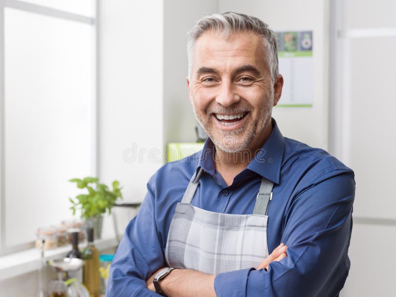 Confident Smiling Man Posing in His Kitchen Stock Photo - Image of ...