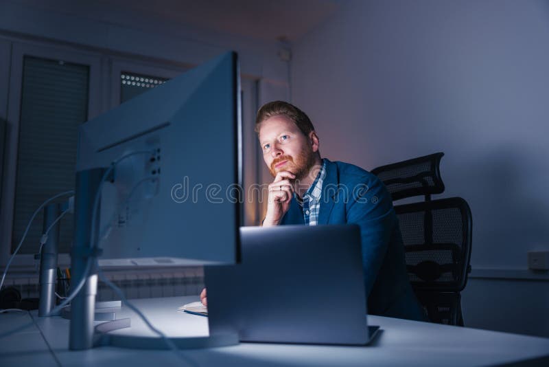 Businessman Working Late in an Office Stock Image - Image of profession ...