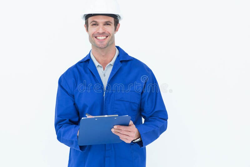 Confident Supervisor Writing Notes on Clipboard Stock Photo - Image of ...
