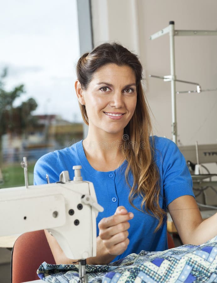 Confident Tailor Sitting at Workbench in Factory Stock Image - Image of ...