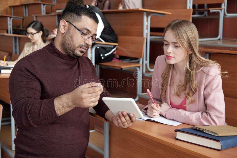 Confident Teacher Making Presentation To Student Stock Image - Image of ...
