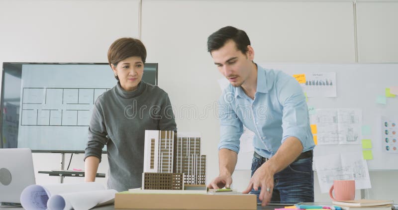 Team of Creative Architects Working Together in a Architect Studio ...