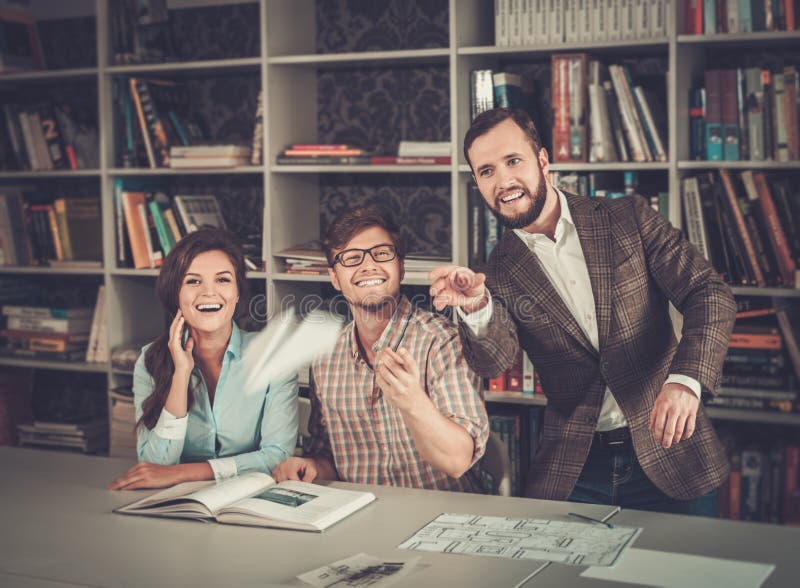 Confident Team of Engineers Having Fun in a Architect Studio. Stock ...