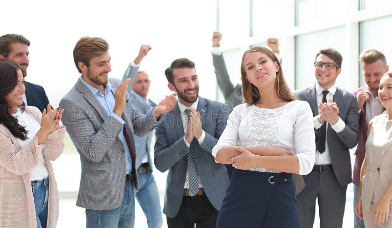 Confident Team Leader Standing in Front of Her Colleagues Stock Photo ...
