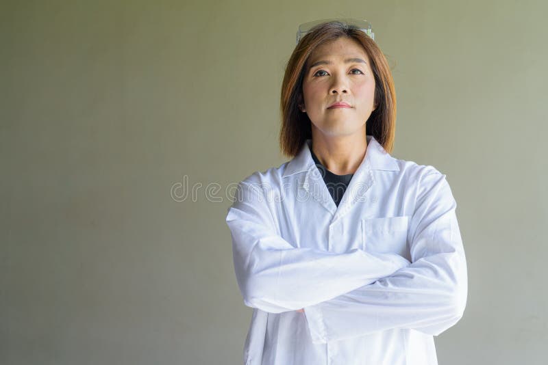 Confident Transgender Non-binary Person in Lab Coat and Protective ...