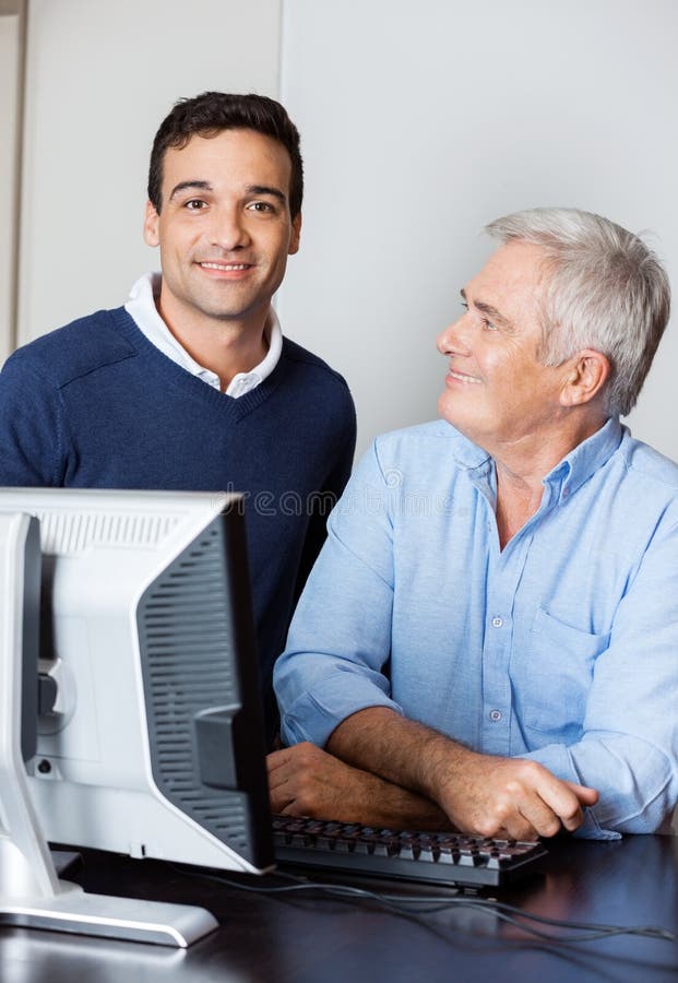 Senior Student Using Computer in Classroom Stock Image - Image of ...