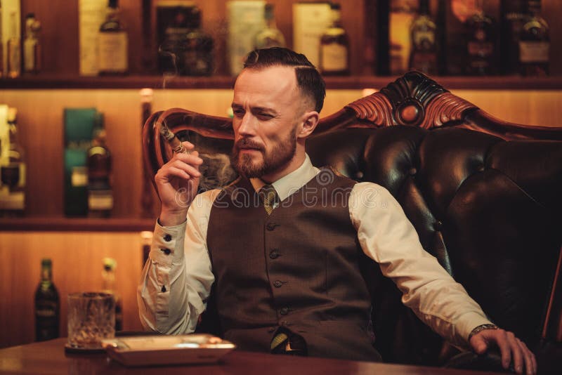 Confident Upper Class Man Smoking Cigar in Gentlemen`s Club Stock Image ...