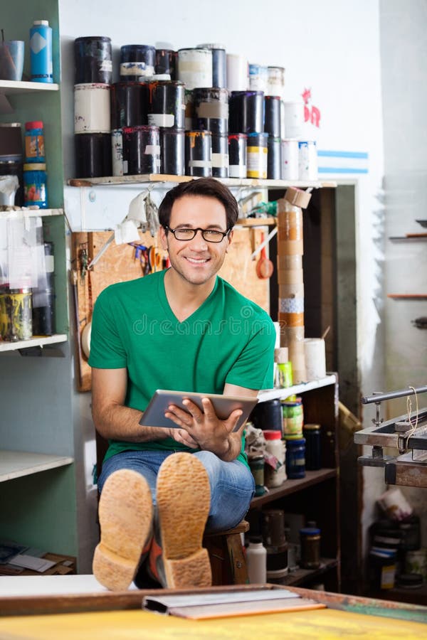 Confident Worker Using Digital Tablet in Paper Stock Image - Image of ...