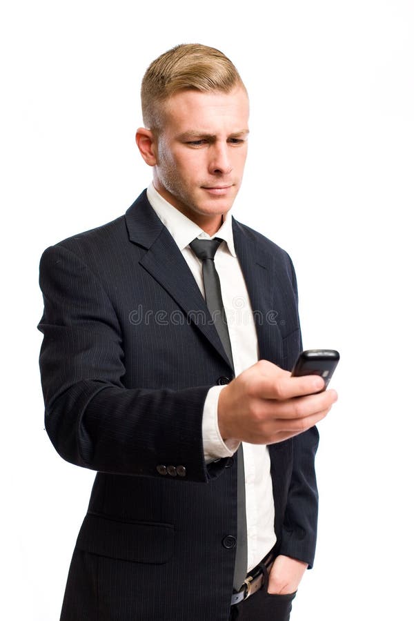 Confident Young Businessman Using His Cellphone. Stock Photo - Image of ...