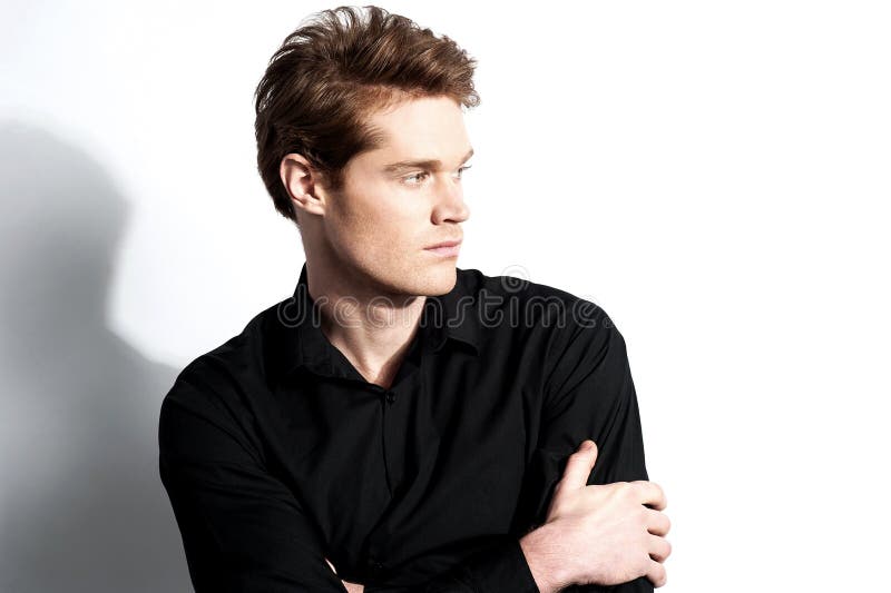Confident Young Guy Looking Away Stock Image - Image of single, folded ...