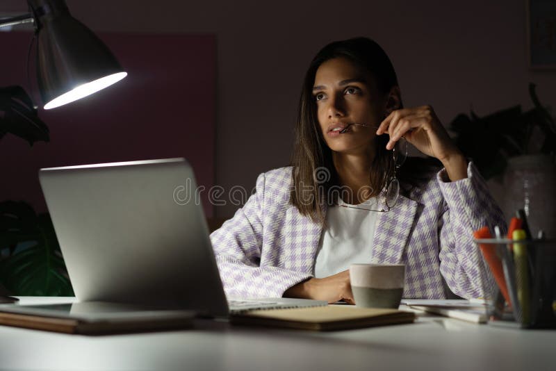 Confident Young Indian Mixed-race Businesswoman Working in Office at ... Confident Young Indian Mixed-race Businesswoman Working in Office at ...
